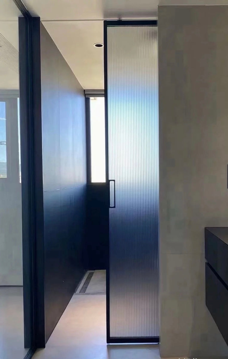 Narrow reeded clear glass soft-stop sliding door – Midea NorthShore